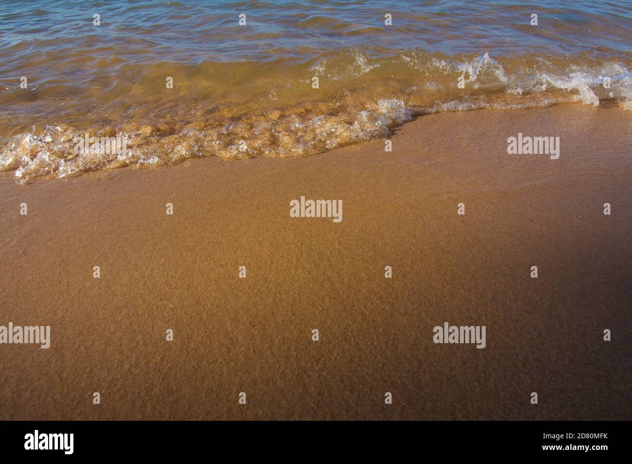 Texture background with surf, sea water and sand on the beach Stock ...