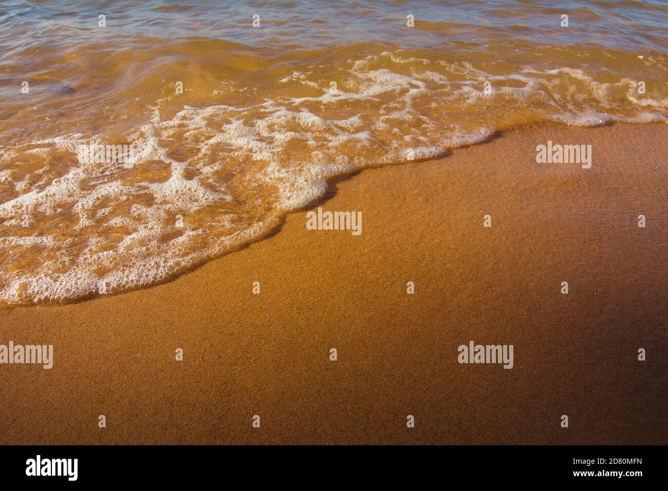 Texture background with surf, sea water and sand on the beach Stock ...
