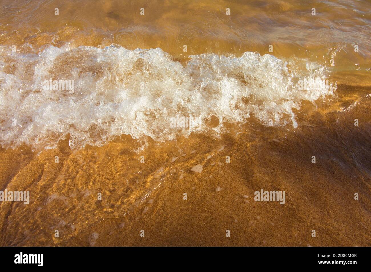 Texture background with surf, sea water and sand on the beach Stock ...