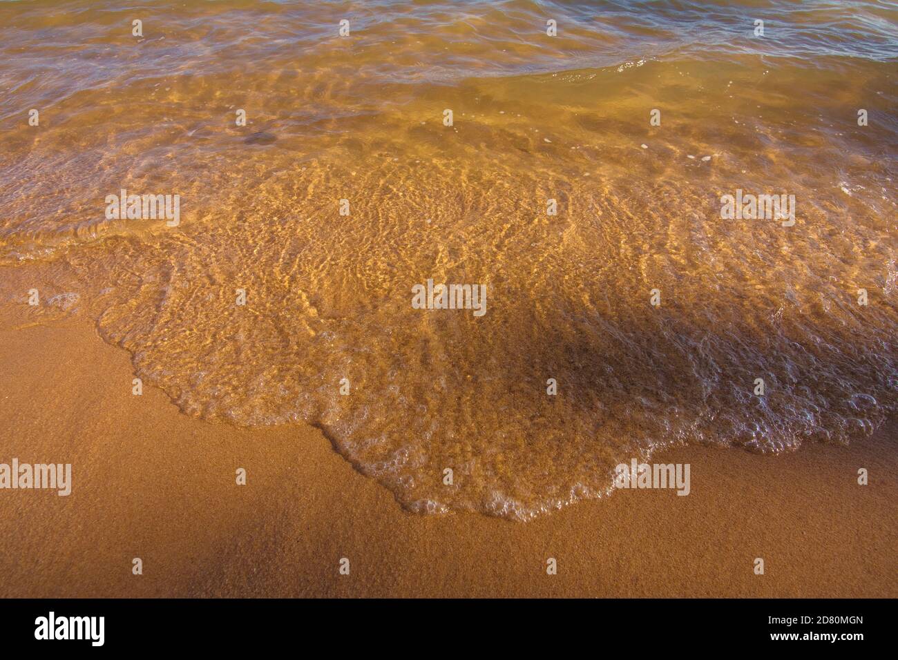 Texture background with surf, sea water and sand on the beach Stock ...