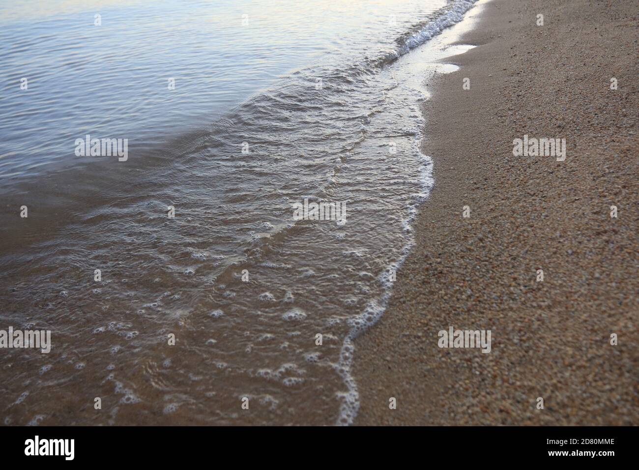 Texture background with surf, sea water and sand on the beach Stock ...