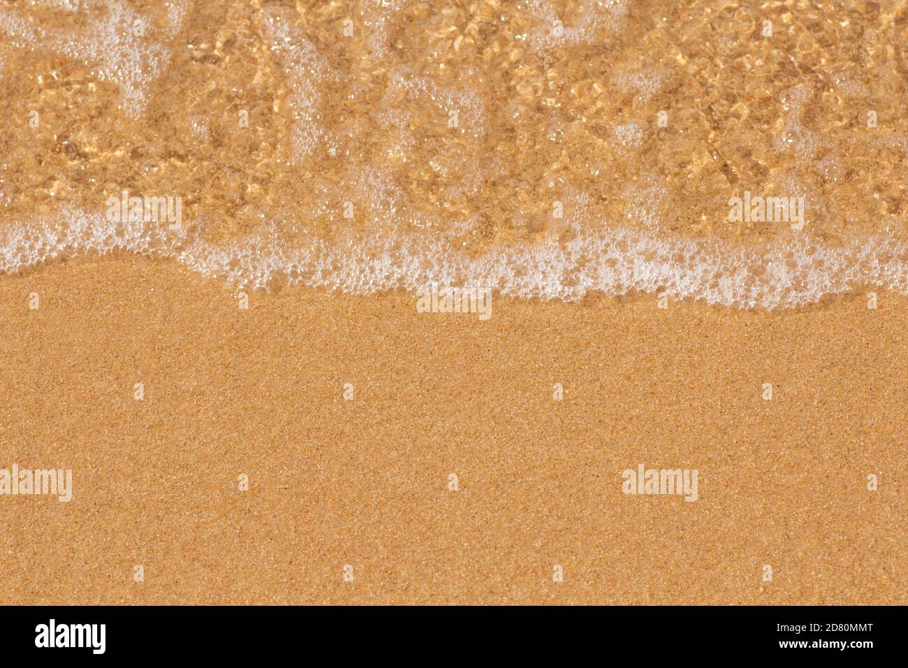 Texture background with surf, sea water and sand on the beach Stock ...