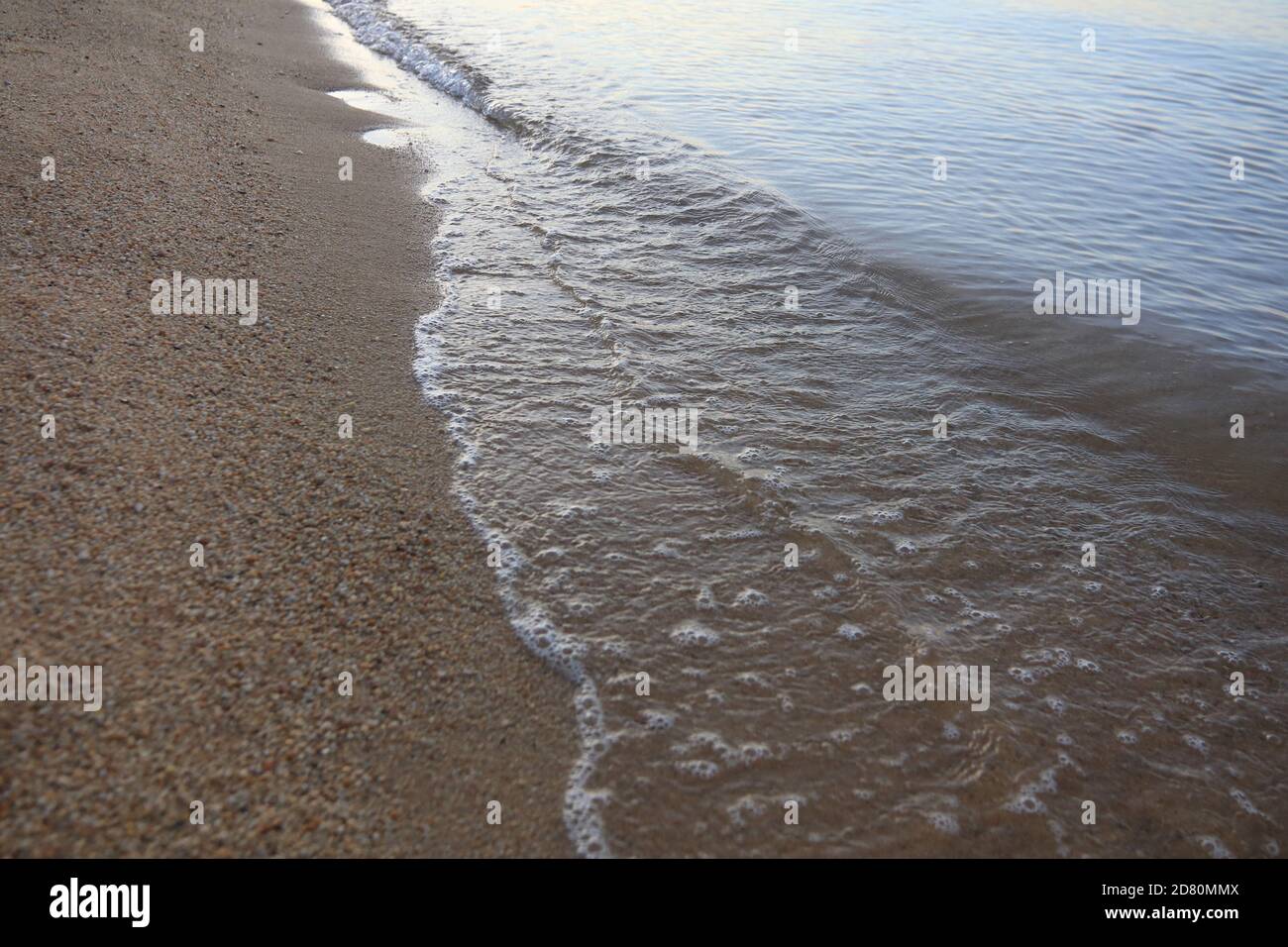 Texture background with surf, sea water and sand on the beach Stock ...