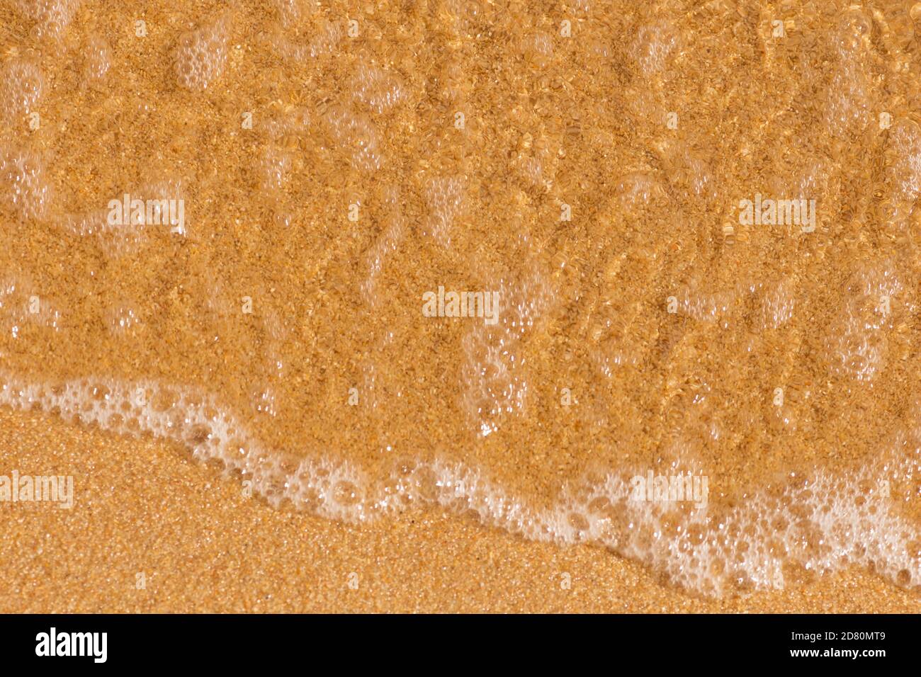 Texture background with surf, sea water and sand on the beach Stock ...