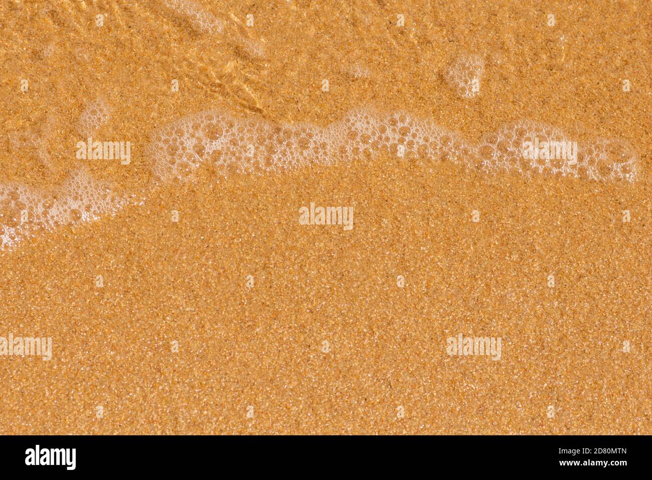 Texture background with surf, sea water and sand on the beach Stock ...