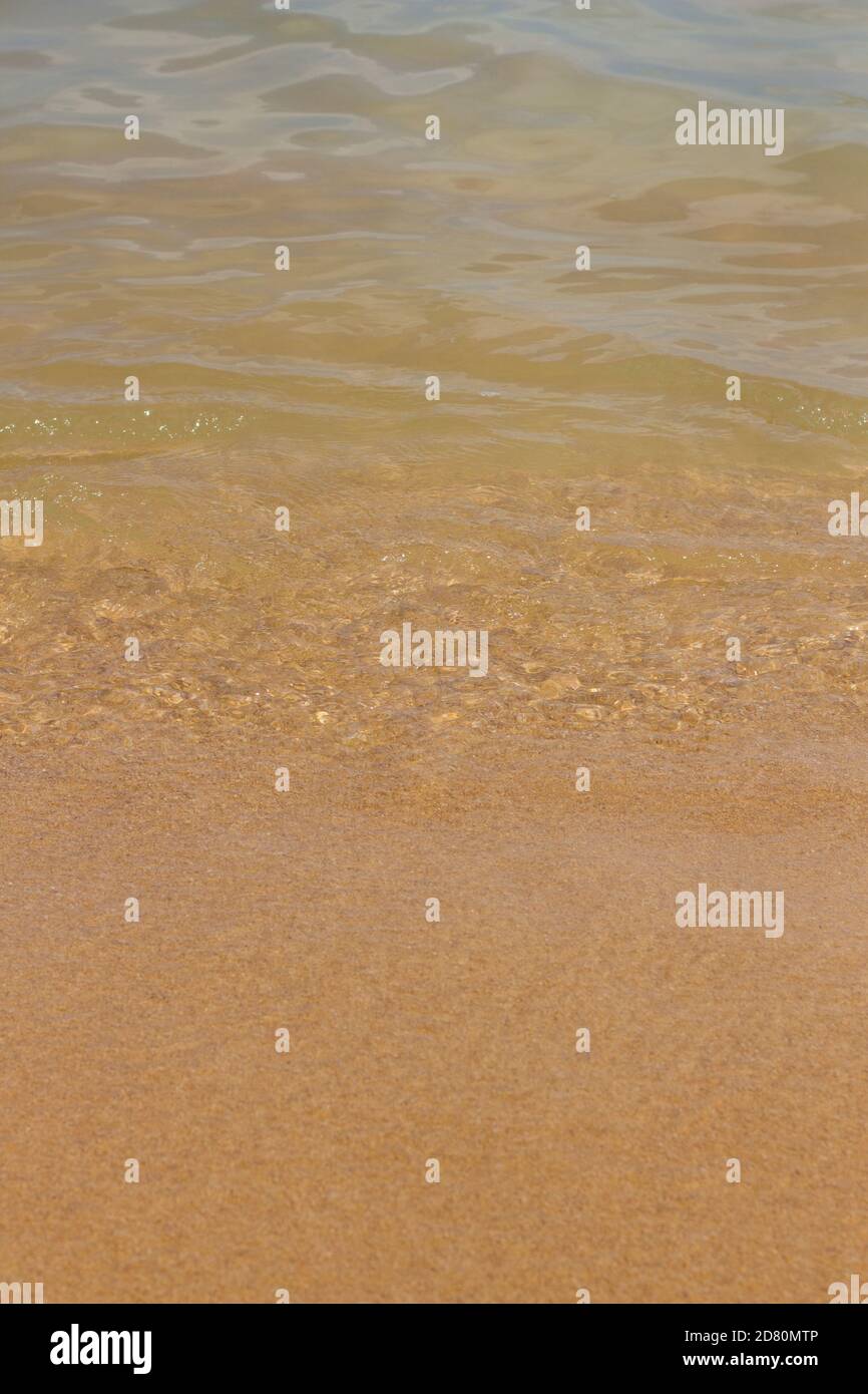 Texture background with surf, sea water and sand on the beach Stock ...