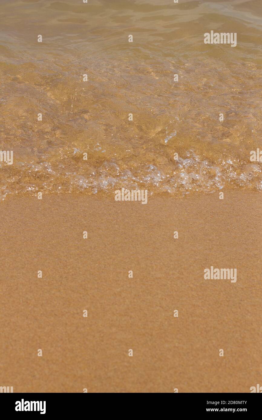 Texture background with surf, sea water and sand on the beach Stock ...