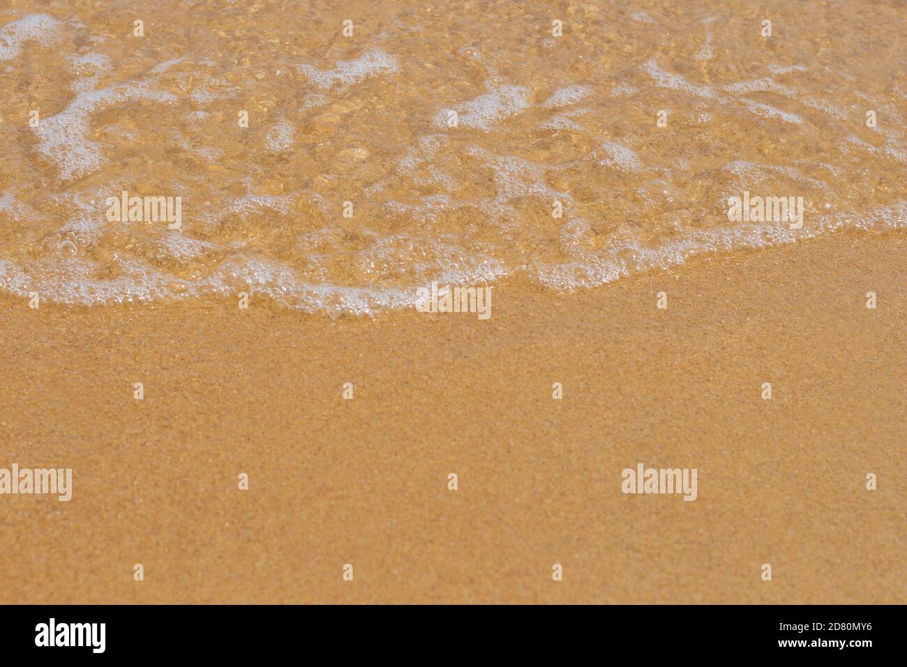 Texture background with surf, sea water and sand on the beach Stock ...