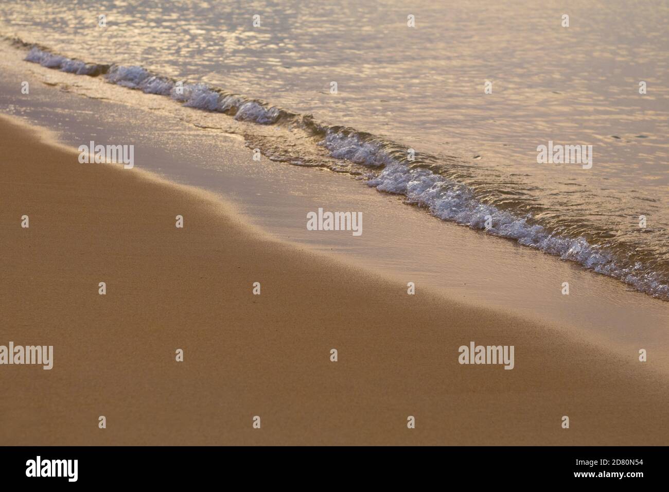 Texture background surf sea water on sand Stock Photo - Alamy