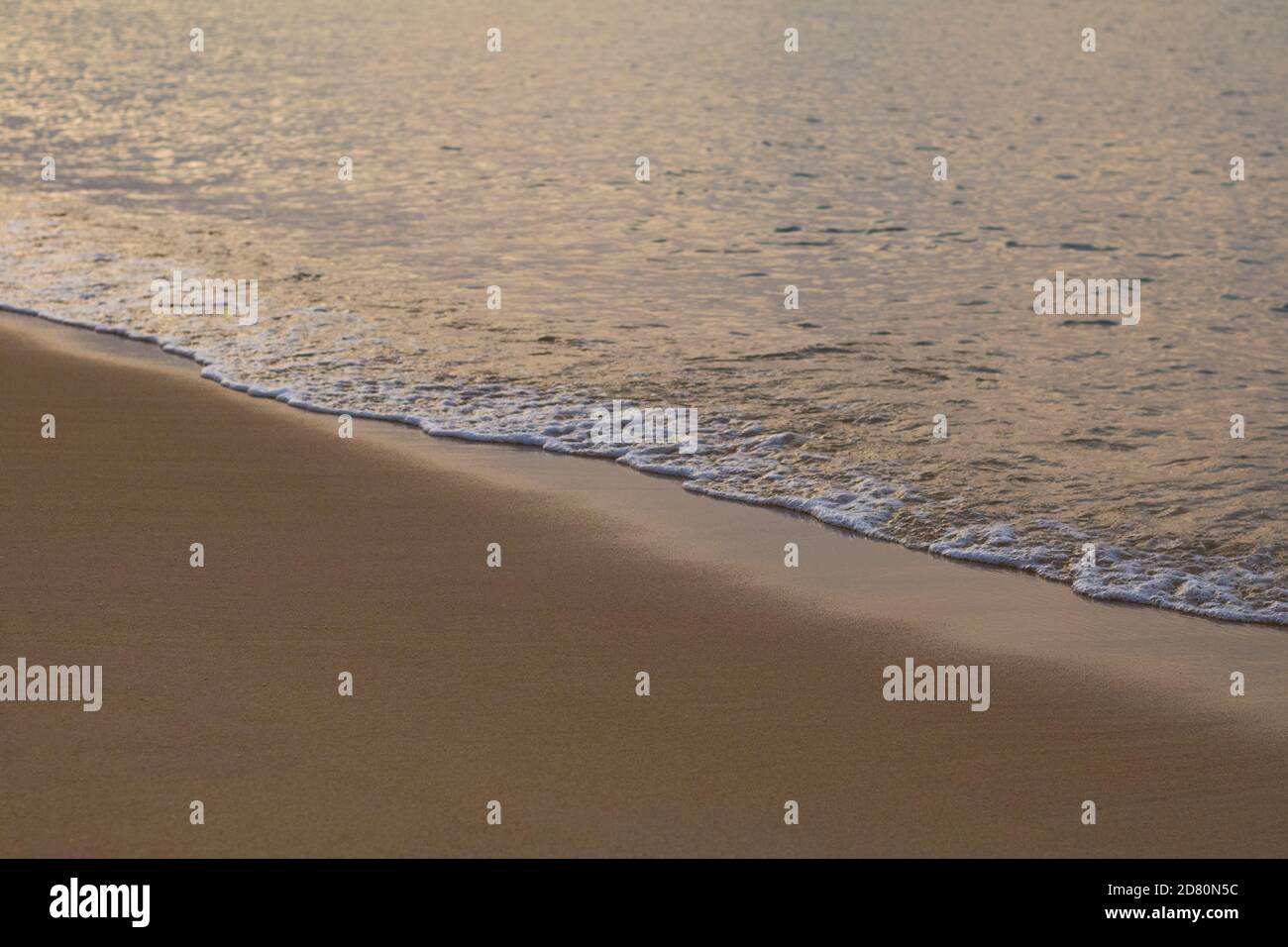 Texture background surf sea water on sand Stock Photo - Alamy