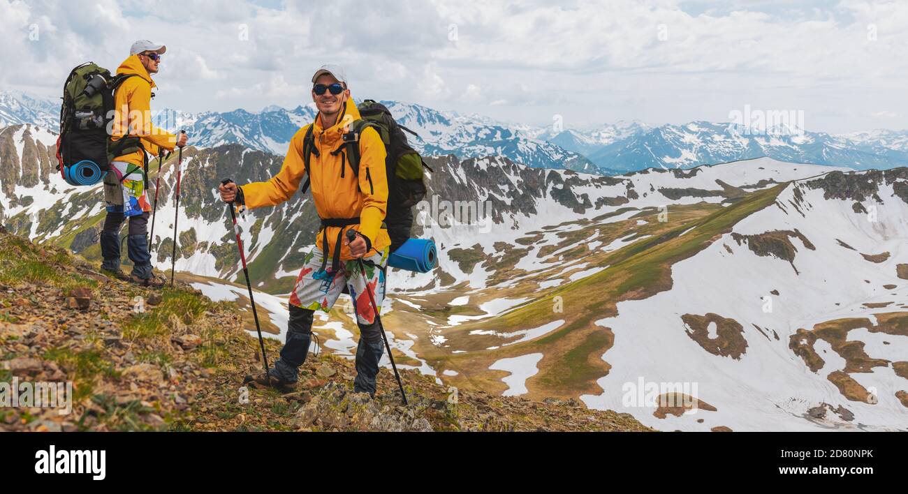 One mountain two people friends concept hi-res stock photography and ...