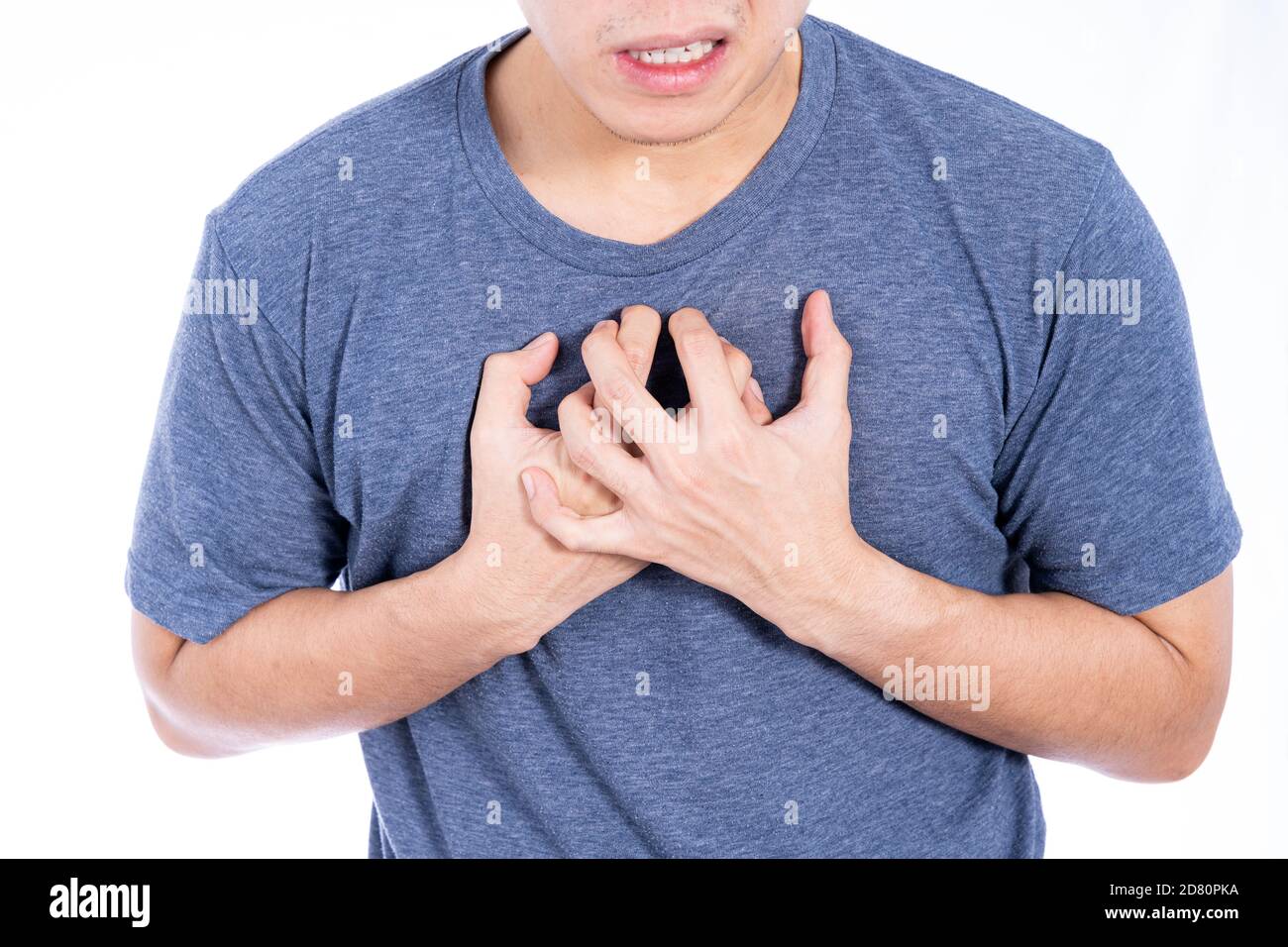 Man touching his heart or chest isolated white background. Healthcare ...