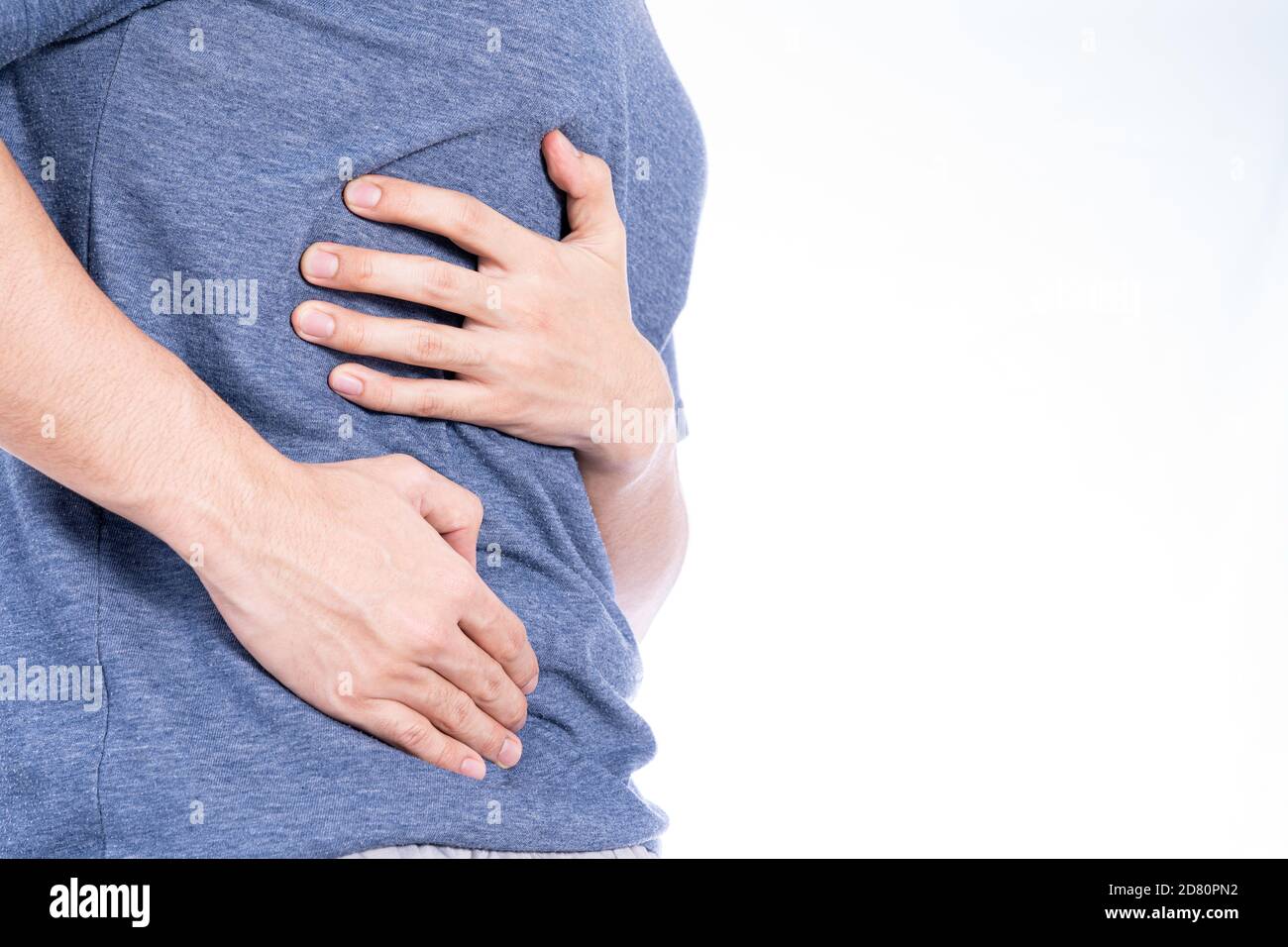 Man hand touching stomach, waist, or liver position isolated white ...