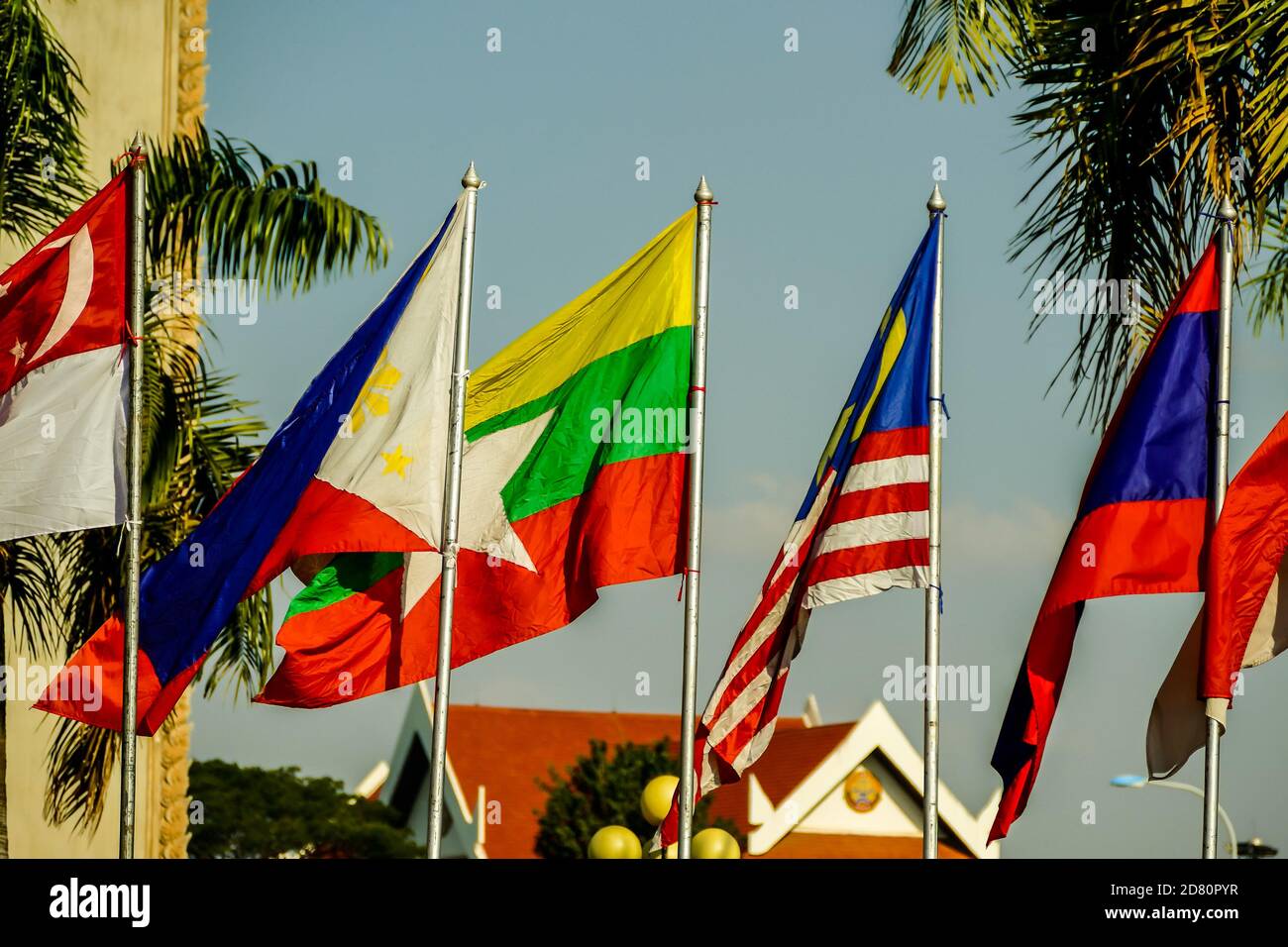 flags of different countries on background of blue sky, digital photo ...