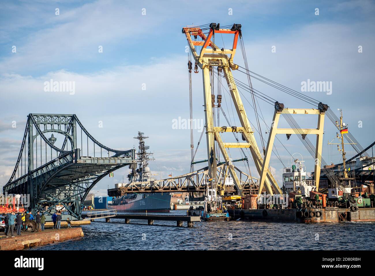 Wilhelmshaven, Germany. 26th Oct, 2020. A floating crane transports the ...