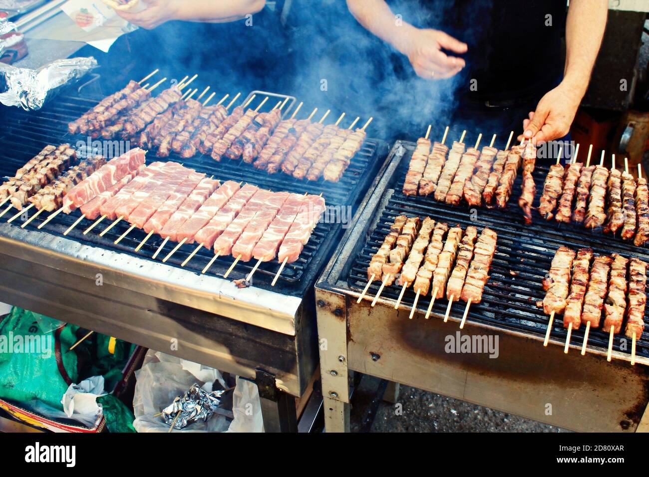 Outdoor barbecue, pork meat grilled Stock Photo - Alamy