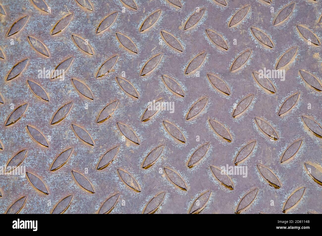 Old metal plate with raised pattern Stock Photo - Alamy