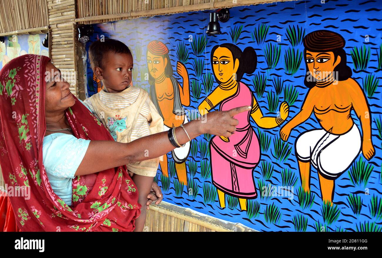 Mother and children are very happy for their big festival of Durga Puja ...