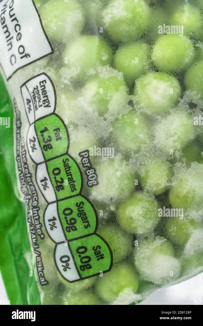 Tesco own label frozen peas in original packaging with part of food ...