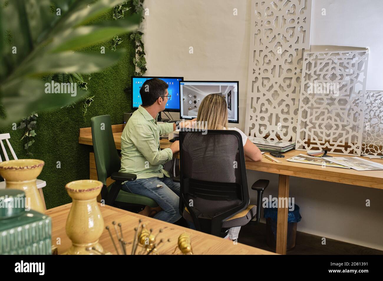 colleagues review their new project on the computer Stock Photo - Alamy