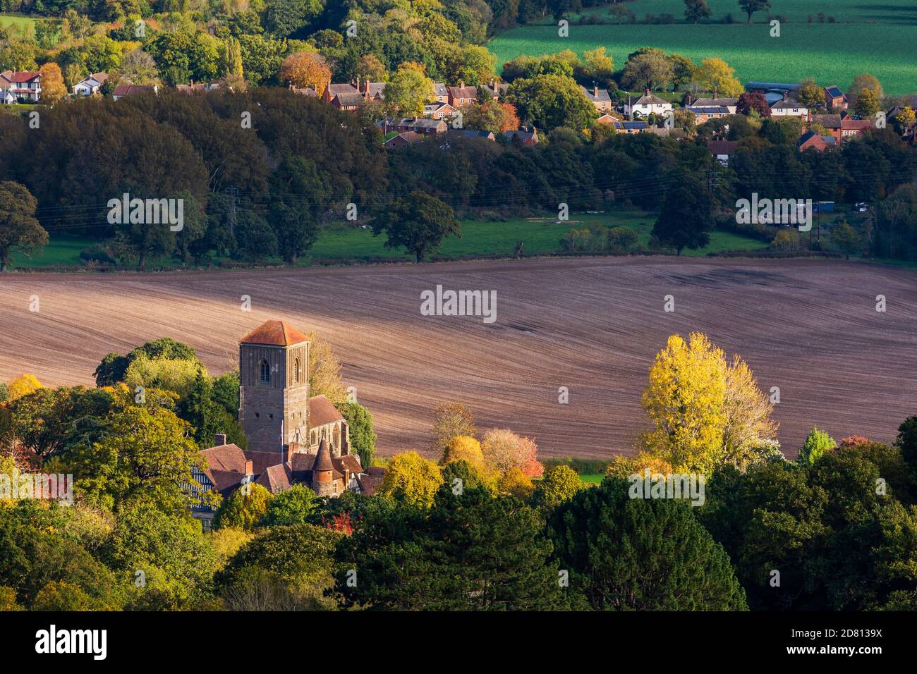 An autumn view of Little Malvern Priory and Little Malvern Court from ...