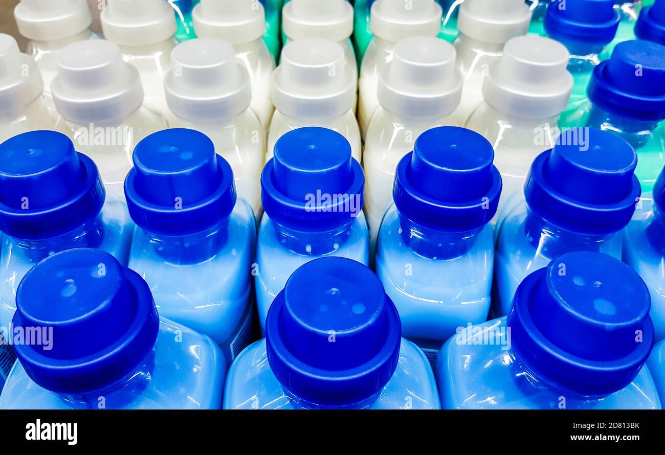 Color plastic bottles in a row Stock Photo - Alamy