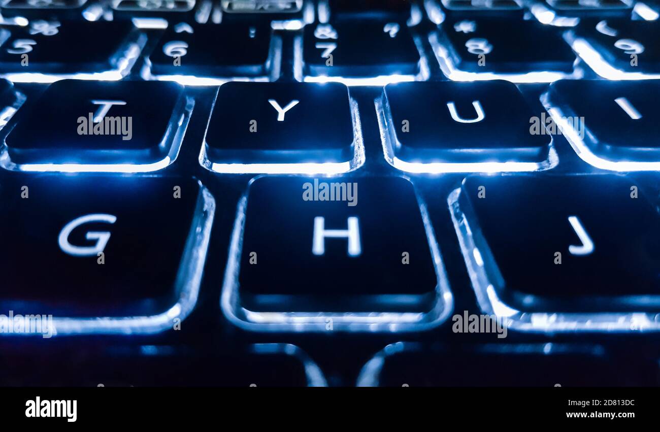 Neon keyboard with enter button. Focus on the Stock Photo - Alamy