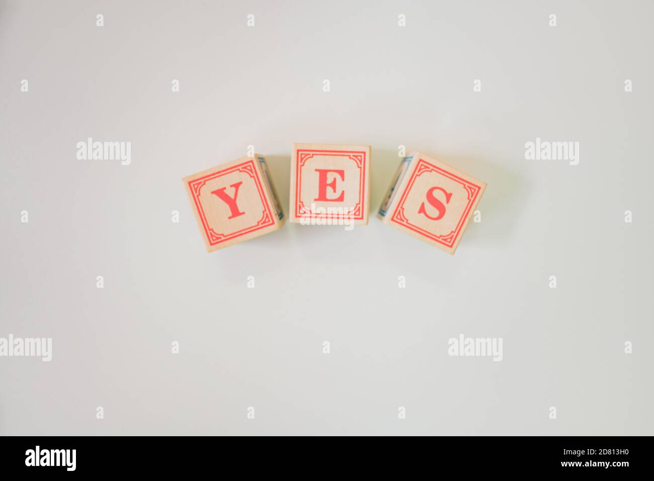 toy blocks spelling out the word yes Stock Photo - Alamy