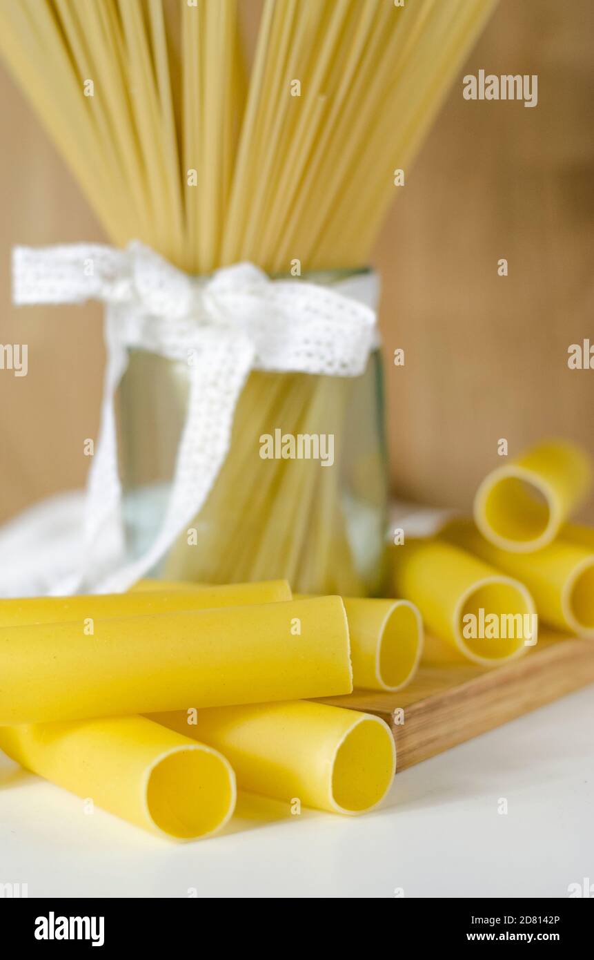 pasta, raw cannellones and spaghetti for cooking Italian dishes Stock ...