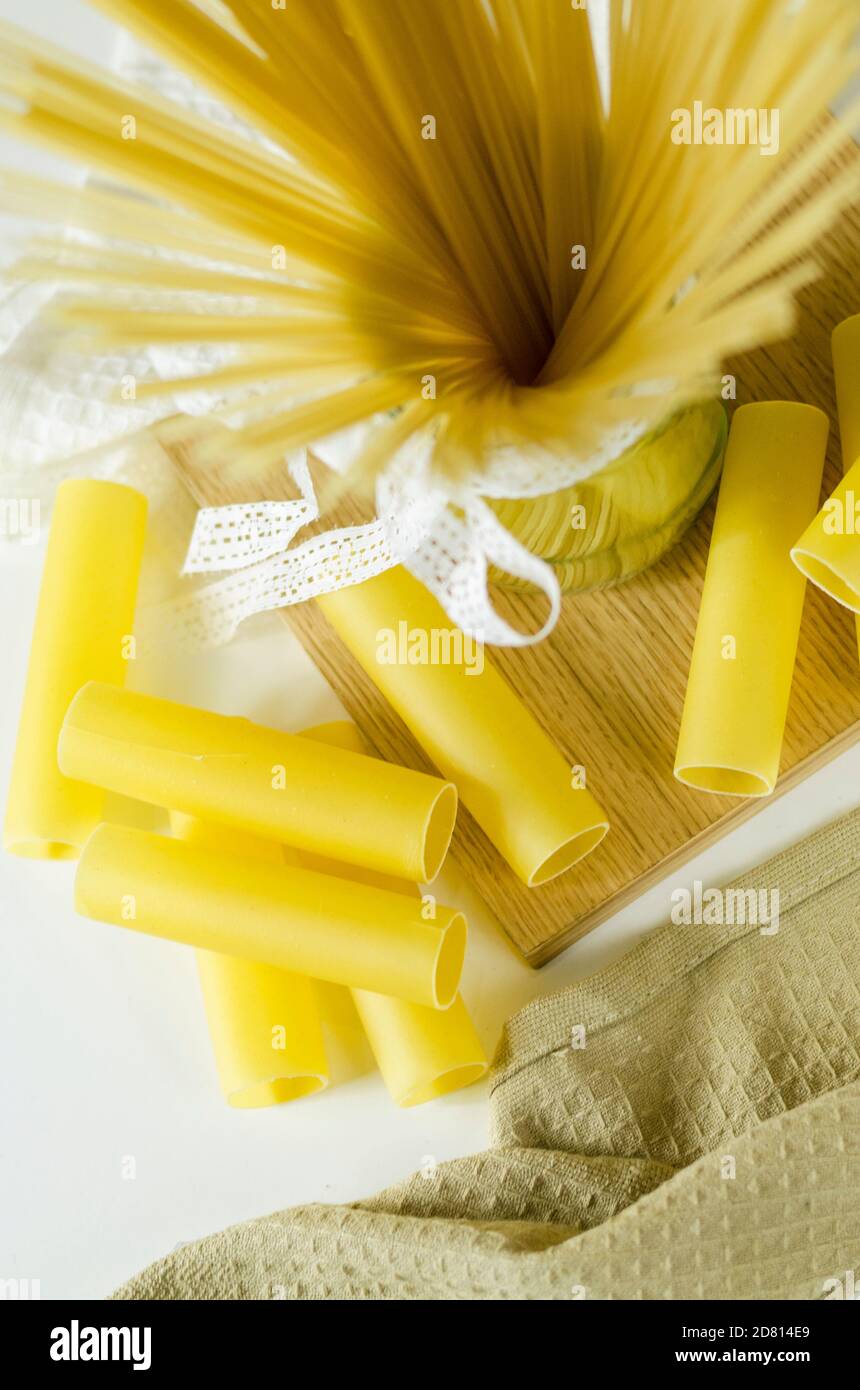 pasta, raw cannellones and spaghetti for cooking Italian dishes Stock ...
