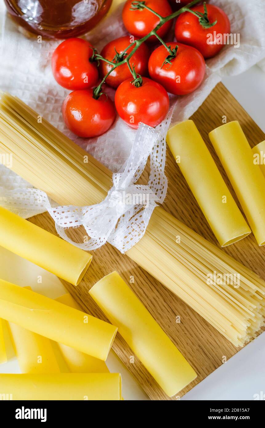 pasta, raw cannellones and spaghetti for cooking Italian dishes Stock ...