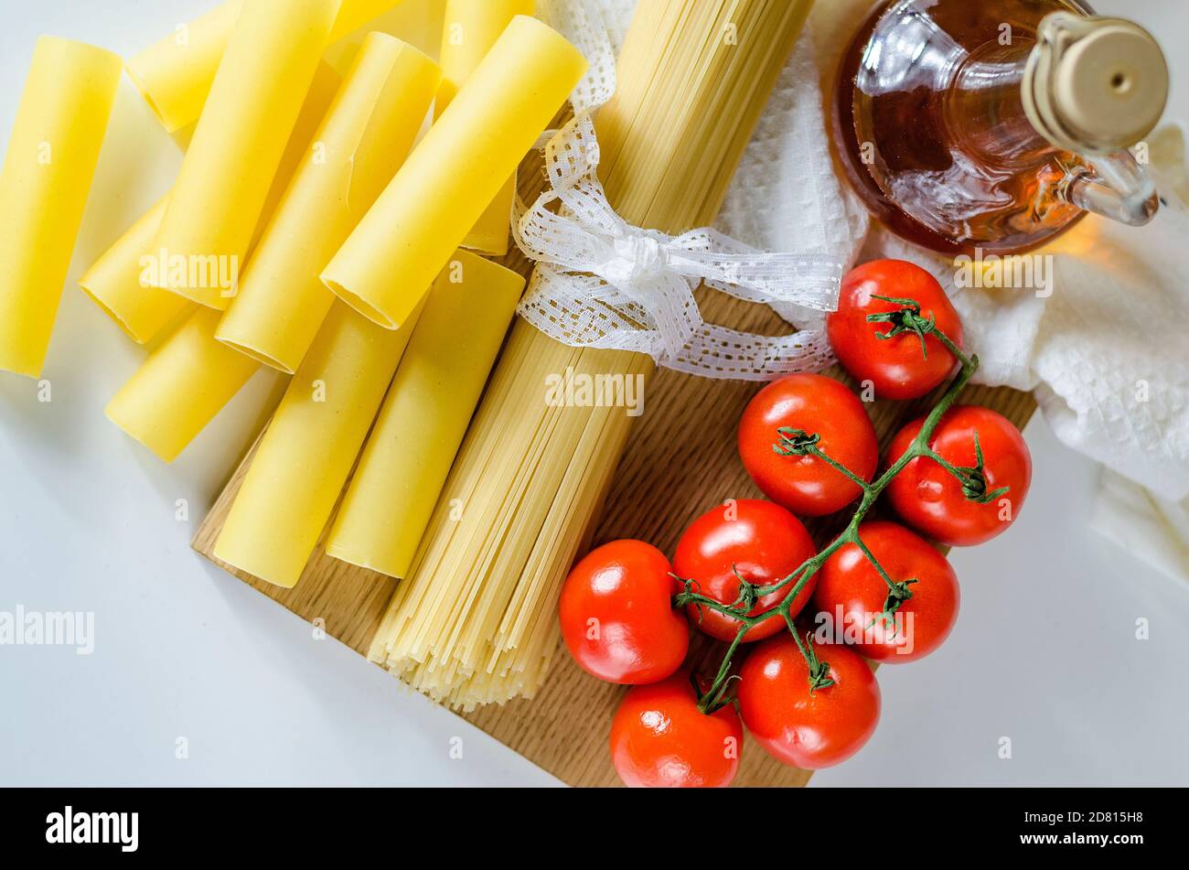 pasta, raw cannellones and spaghetti for cooking Italian dishes Stock ...