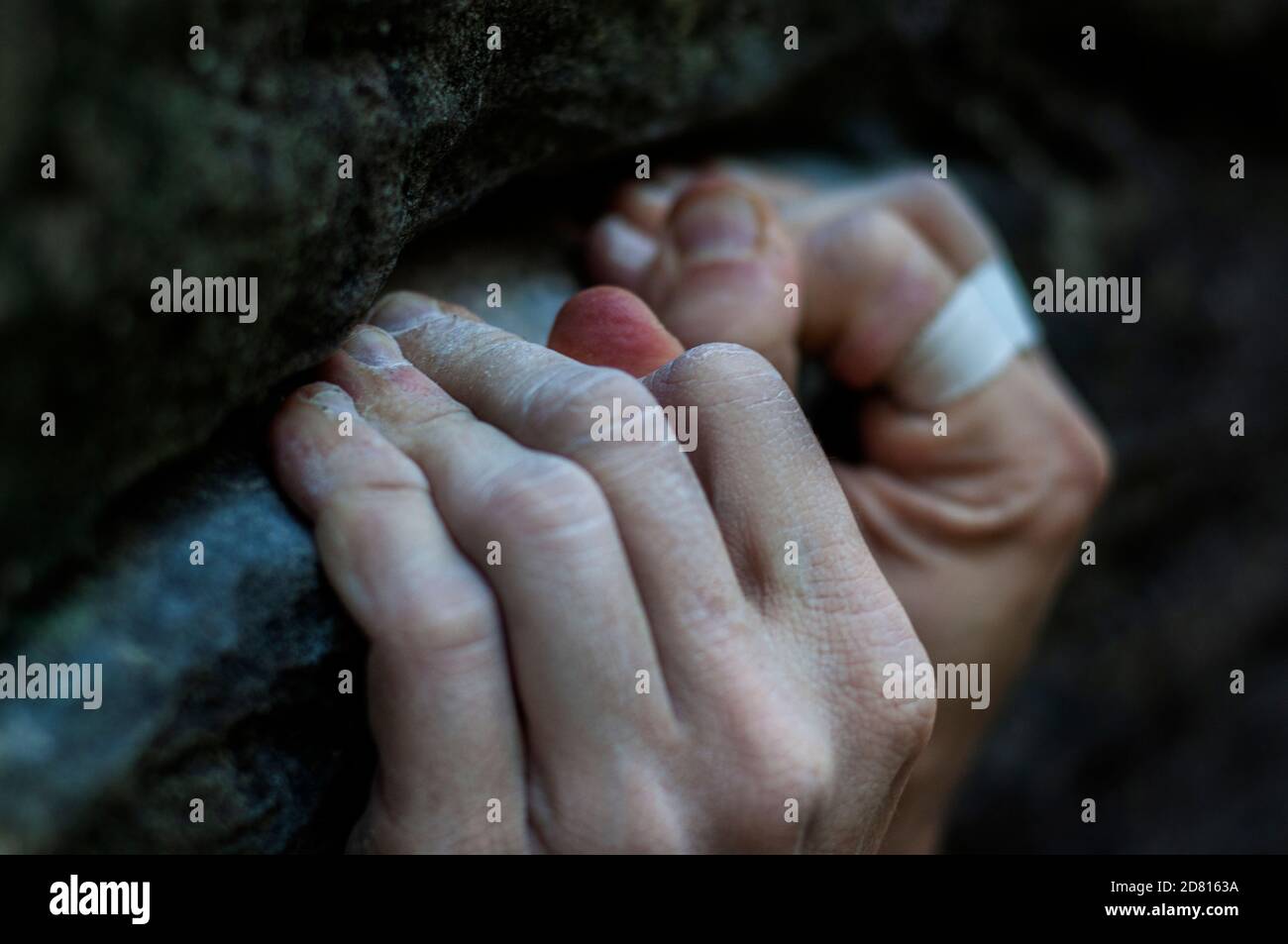 Rock climber's hands on handhold Stock Photo - Alamy
