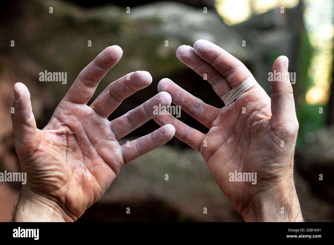 Climber hands, hard, after effort, hard work Stock Photo - Alamy