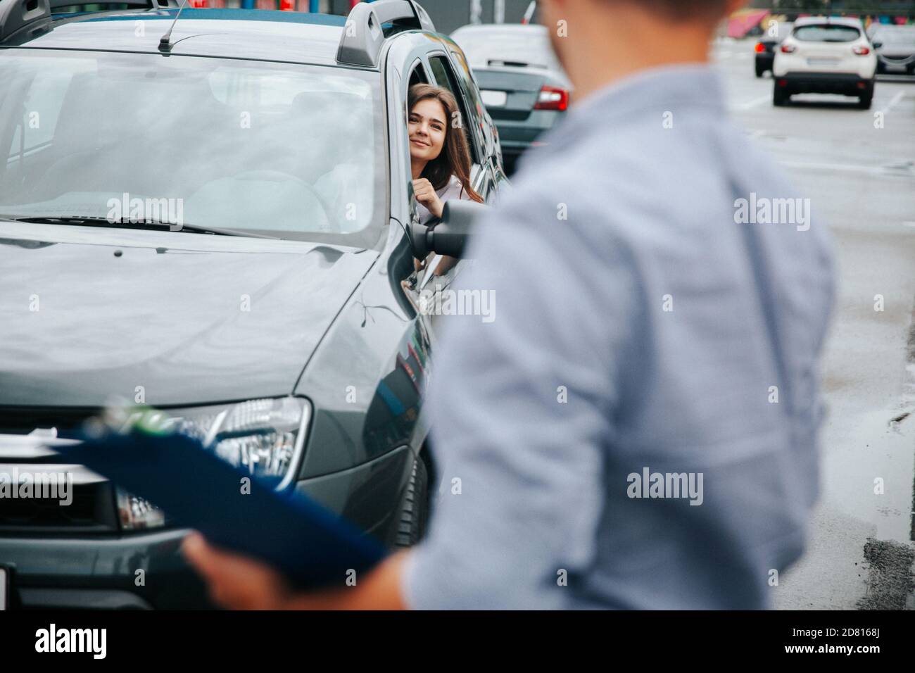 Woman looks around road hi-res stock photography and images - Alamy