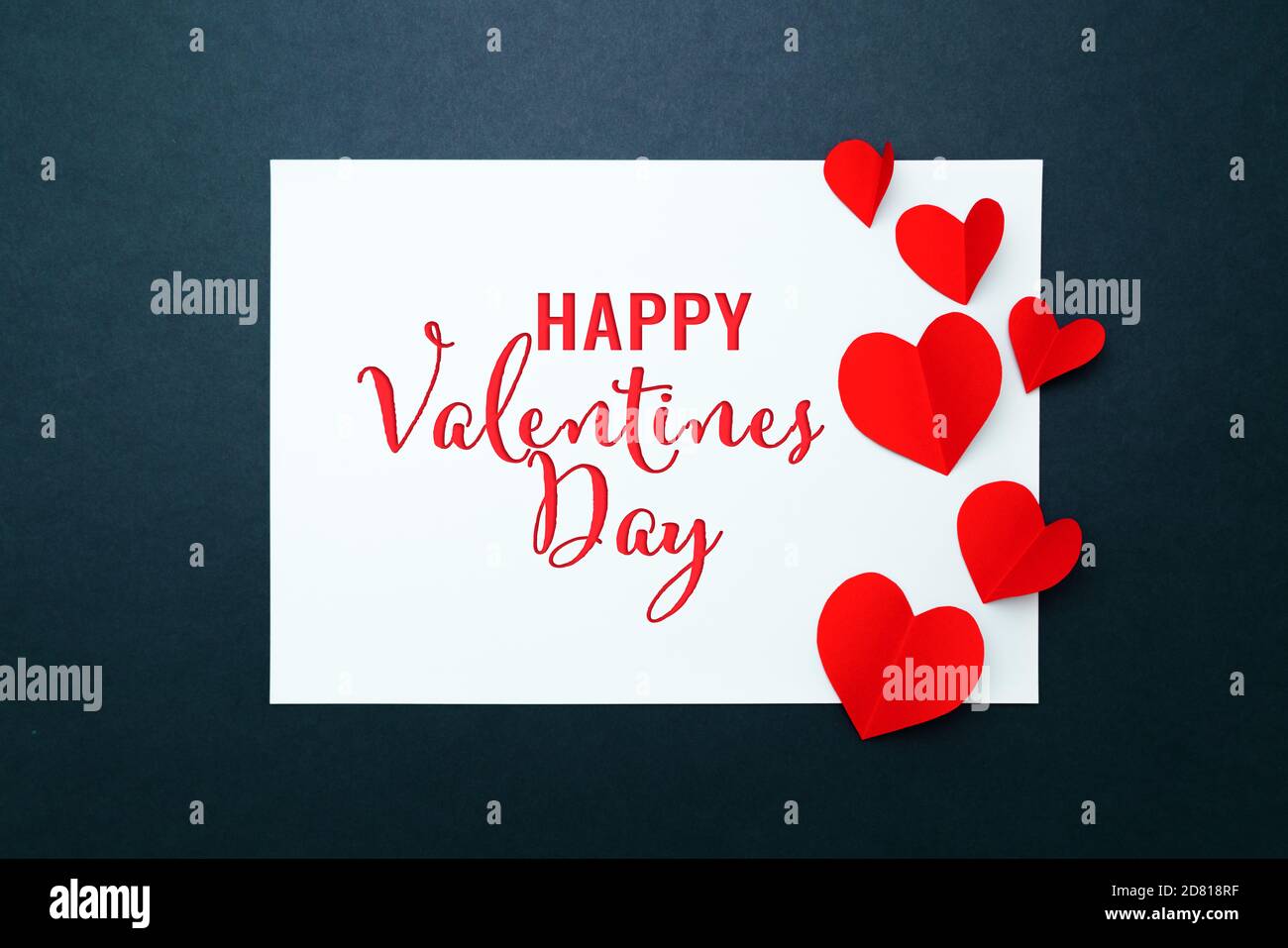 Valentine card with red heart on blue paper frame, flat lay, top view ...