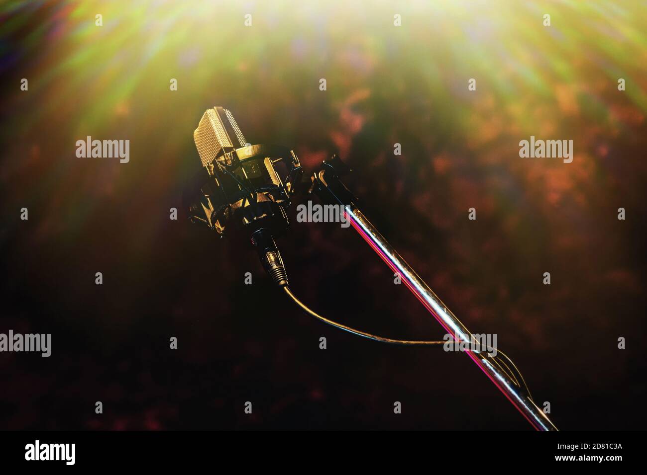 Microphone oncolor background. Retro microphone. A microphone on stage ...