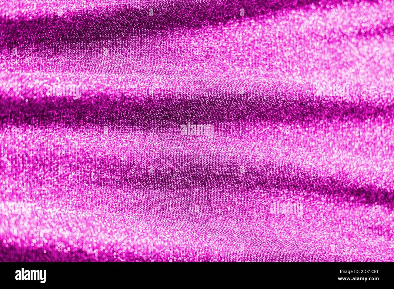 Colored raspberry pink magenta shiny fabric texture with folds. Surface ...