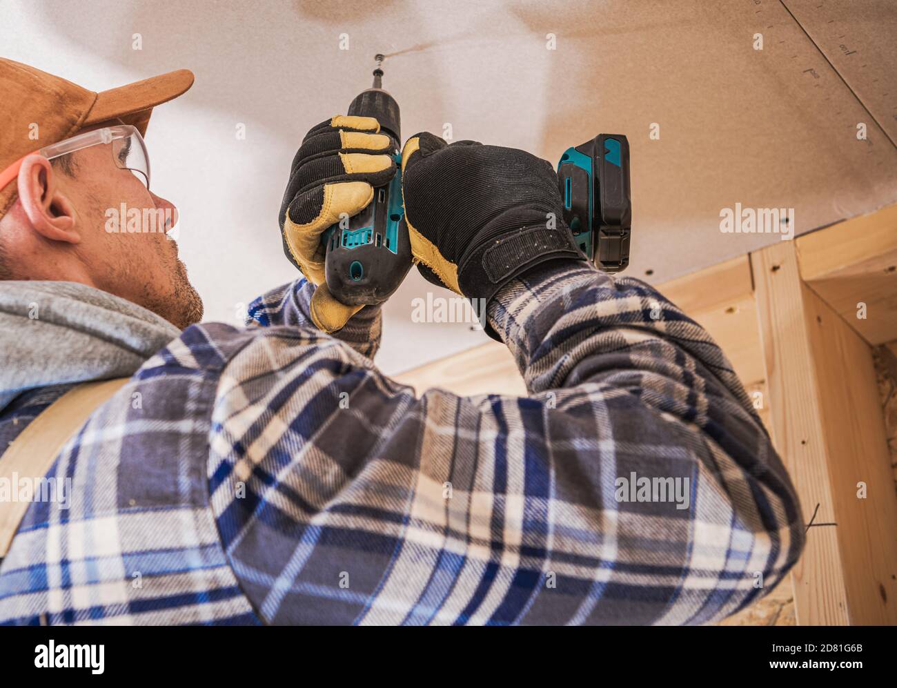 Caucasian Construction Contractor Assembling Drywall Board Using ...