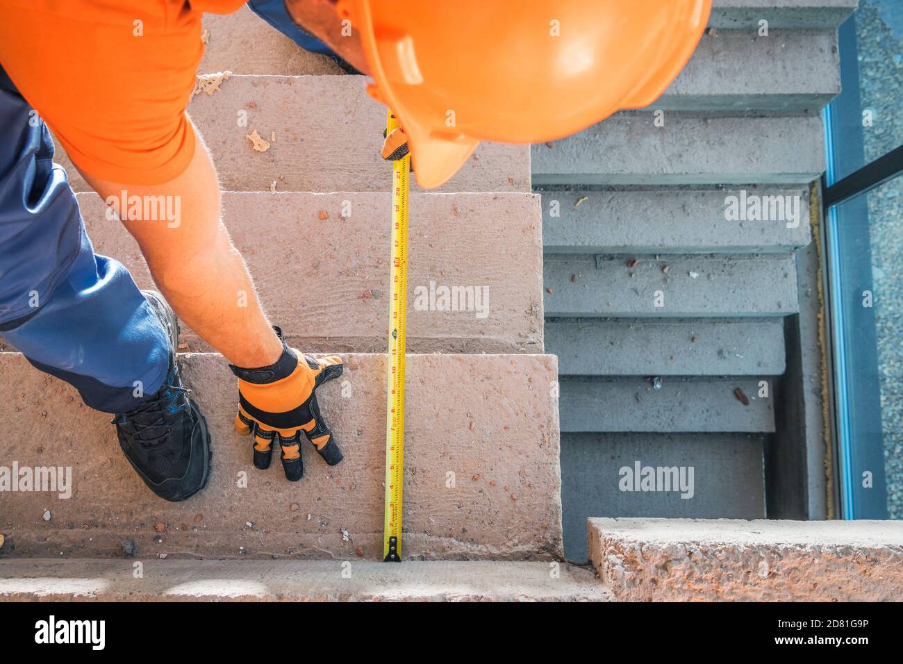 Caucasian Construction Contractor Measuring Concrete Building Steps ...