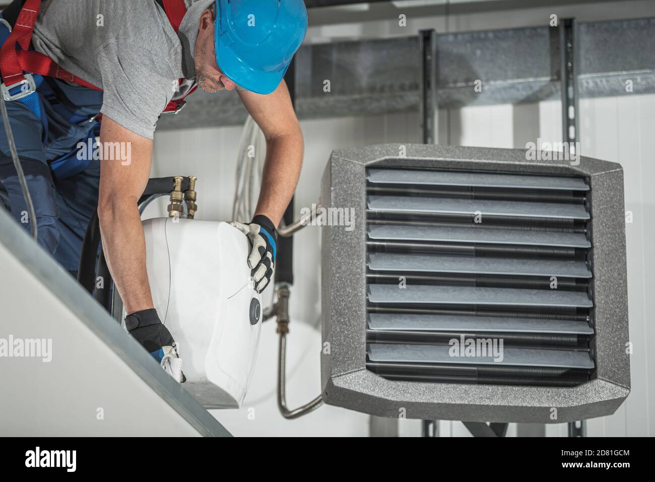 Water Heating Device Installation Inside Warehouse Building Next to ...