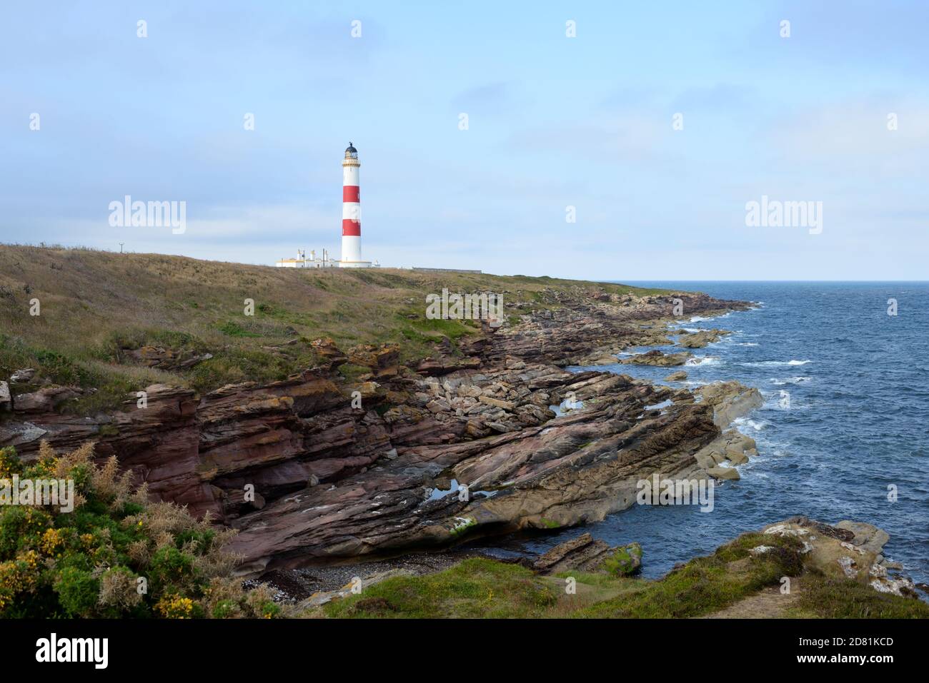 Tarbat Ness Lighthouse dominates the rocky coastline. Originally built ...