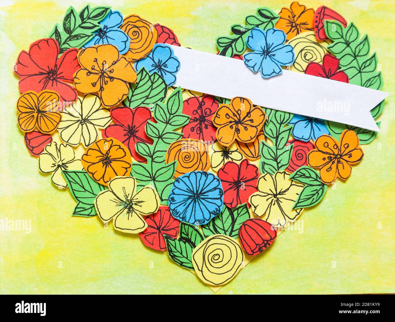 Handcrafted postcard with blank tag and cutout flowers in heart shape ...