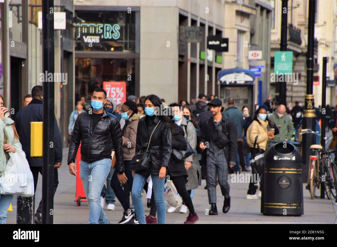 People wearing face masks on Oxford Street, London Stock Photo - Alamy