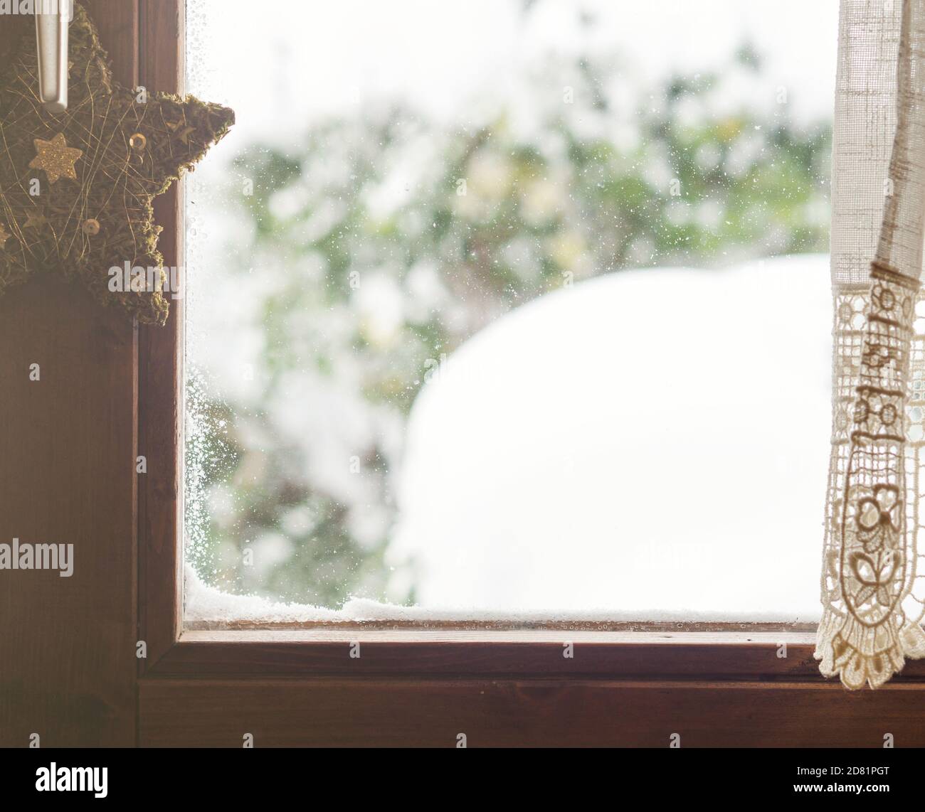 Winter tree branches seen from the window Stock Photo - Alamy
