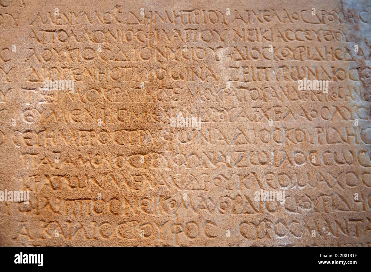 Fragment of the ancient greek letters carved on the stone Stock Photo ...
