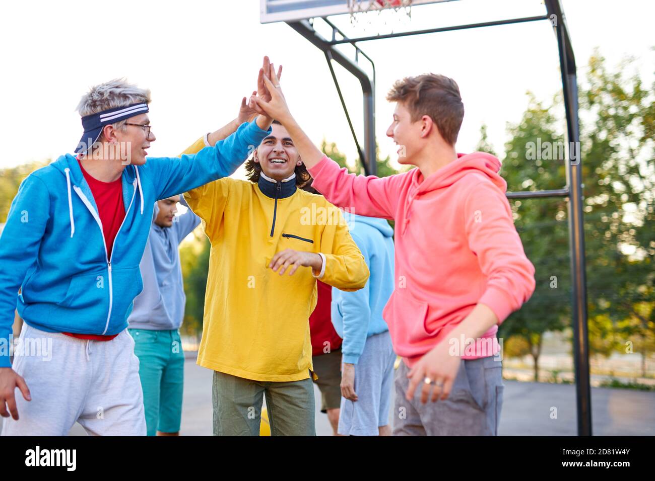 Teen boy shooting basketball hi-res stock photography and images - Alamy