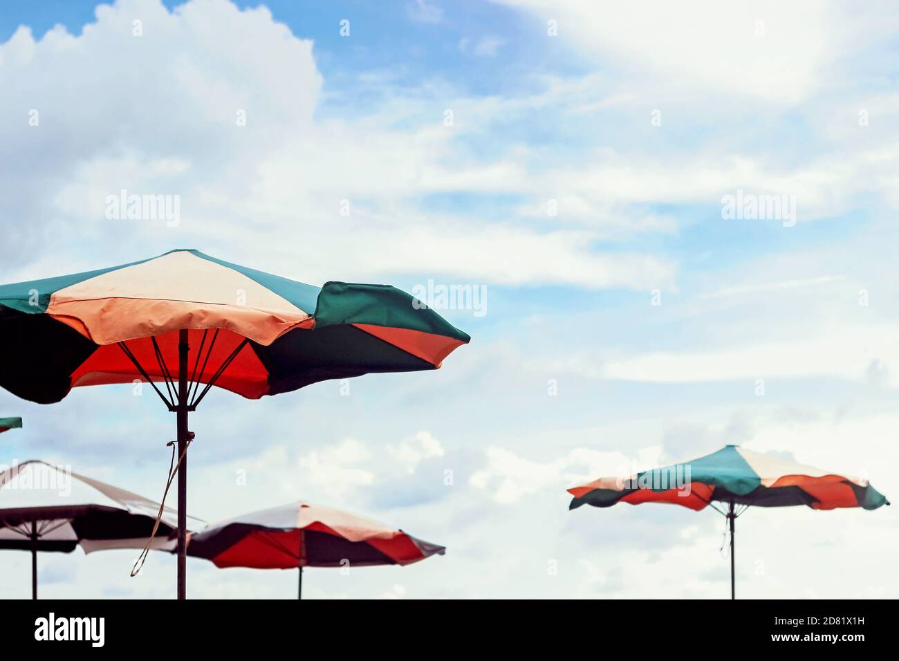 Parasols blue sky shadow hi-res stock photography and images - Alamy