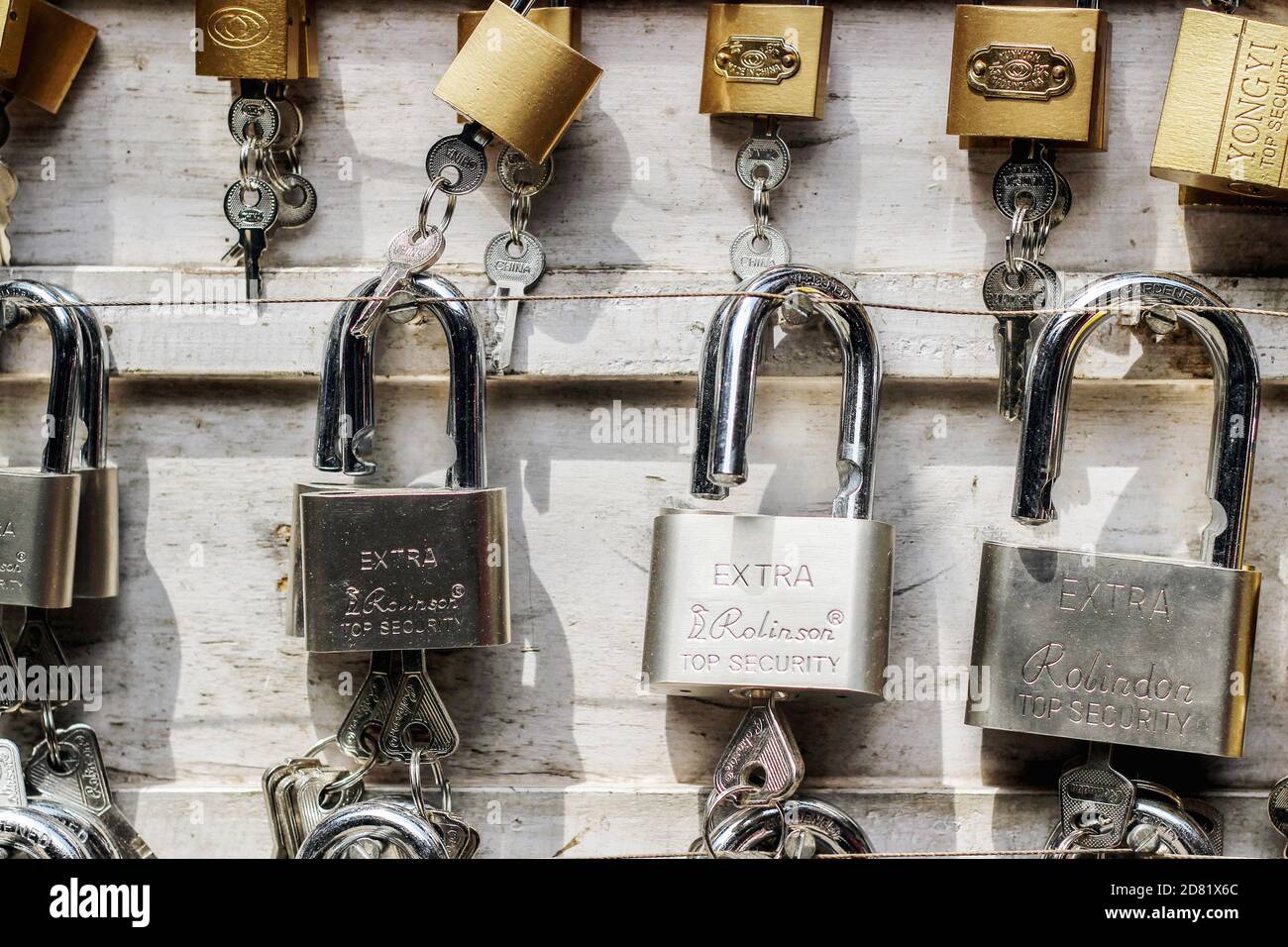 a pile of old metal locks on wall Stock Photo - Alamy