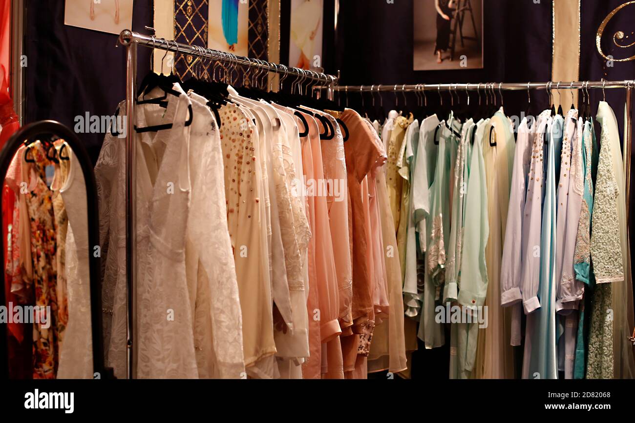 Indian modern wedding festive dresses store with mirror, racks and ...